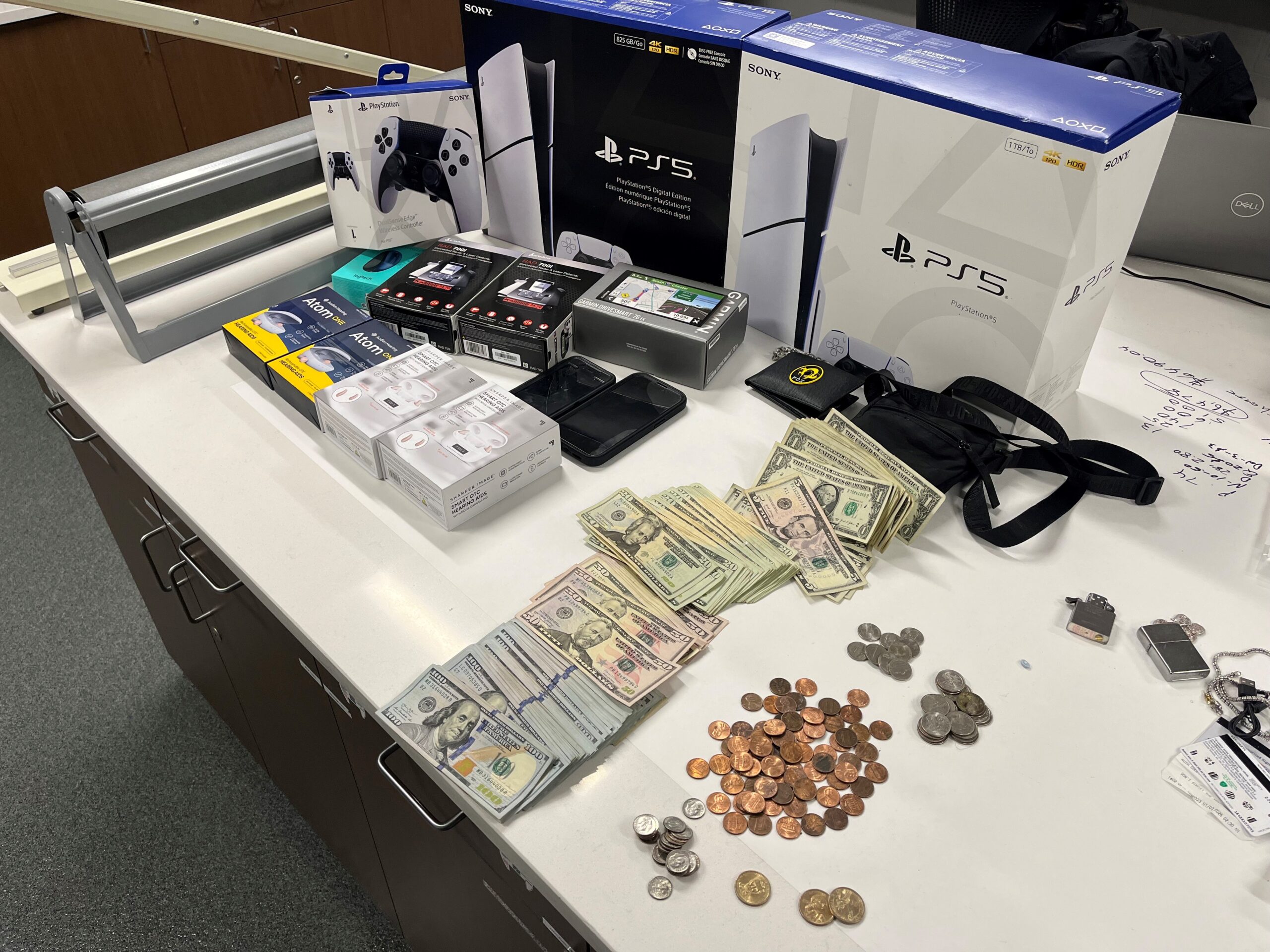Four suspects arrested after alleged retail scam reaches Lawrence ...